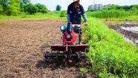 China Four-Wheel Drive Multu-purpose Agricultural Equipment 173F Diesel Engine Cultivator for Garden for sale
