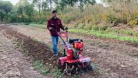 China Powerful 186F Diesel Engine Four-Wheel Drive Cultivator for Paddy Fields and Dry Land for sale