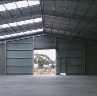 China CE Metal Sloping Roof Steel Workshop Building Pre Engineered Metal Garage Customised for sale