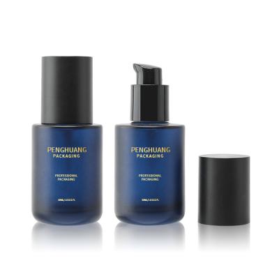 China Luxury Clear 30ml Liquid Foundation Bottles With Black Gold Collar Lotion Pump for sale