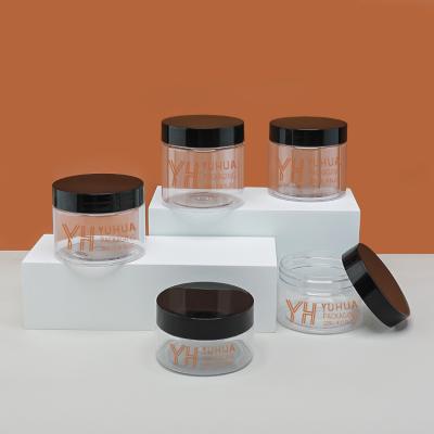 China Round Plastic PET Jar With Black Flip Top Cap 100g To 200g for sale