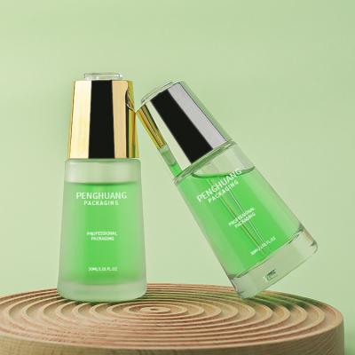 China 30ml Glass Dropper Bottle With Logo Silk Screen Printing Glossy Golden Sliver Left Right Press Dropper for sale