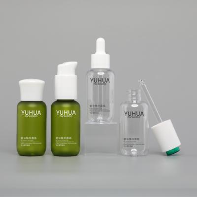 China 2oz Recycled PCR 60ML Plastic Face Serum Bottles Push Bottom Dropper for sale
