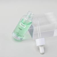 China Clear Glass Cosmetic Bottle 30ml 1oz with Dropper Cap for Serum Packaging for sale
