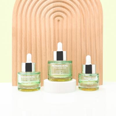 China Green Glass Essential Oil Serum Dropper Bottles 20ml 30ml 50ml for sale