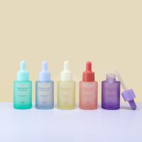 China Frosted Colorful Glass Serum Bottle Cosmetic Packaging Glass Essential Oil Dropper Bottles 30ml for sale