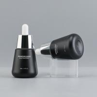 China Frosted Black Glass Oil Serum Dropper Bottles Logo Customized 30ml for sale