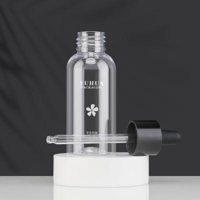 China 80ml Round Base Makeup Pet Cosmetic Bottle With Black Dropper for sale