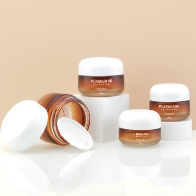 China OEM Cream Glass Jars Luxury Cosmetic Packaging With Dome Cap for sale