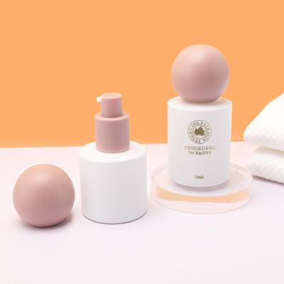 China White 30ml 50ml Lotion Glass Bottles With Round Cap And Pump for sale