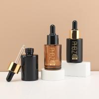 China Customized Printing Serum Dropper Bottles 30ml Glass Essential Oil Bottle for sale