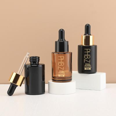 China Customized Printing Serum Dropper Bottles 30ml Glass Essential Oil Bottle for sale