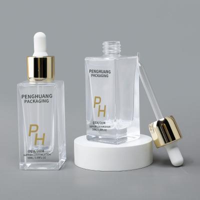 China YUHUA Serum Dropper Bottles Custom Logo Square Clear Hair Oil Glass Dropper Bottle 1oz 30ml 50ml for sale