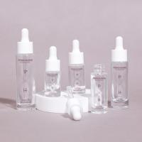 China Custom Logo Transparent Oil Dropper Glass Bottle For Serum Hair Oil for sale