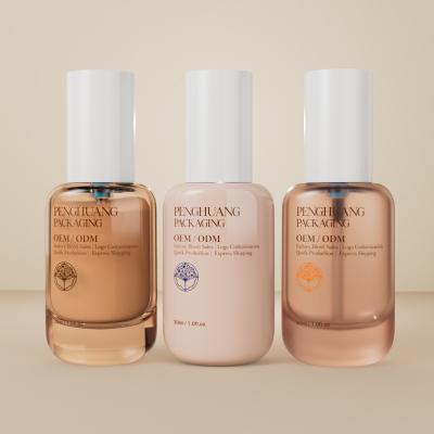 China Transparent Foundation Glass Bottle 30ml 1oz  Empty Foundation Bottles With Cap for sale
