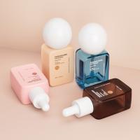 China Luxury Wholesale Foundation Bottles 30ML Round Ball Cap Thick Bottom Empty Liquid Foundation Bottles for sale