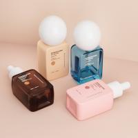 China Luxury Wholesale Foundation Bottles 30ML Round Ball Cap Thick Bottom Empty Liquid Foundation Bottles for sale