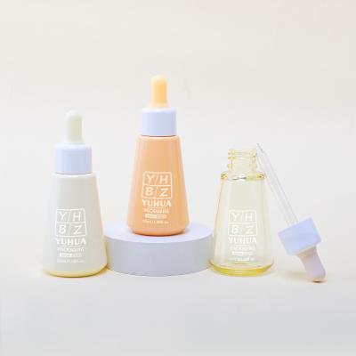 China Blue Oil Serum Bottle The Perfect Addition to Your Skincare Routine for sale