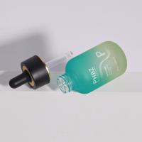 China 30ml Glass Round Matte Dropper Bottle Oil Serum Bottle Designed for Skincare Essential Oils and Cosmetic Packaging Needs for sale