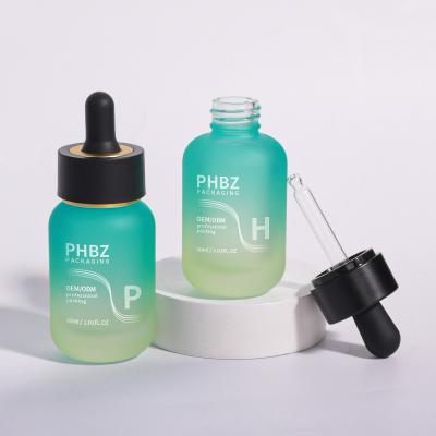 China 30ml Glass Round Matte Dropper Bottle Oil Serum Bottle Designed for Skincare Essential Oils and Cosmetic Packaging Needs for sale
