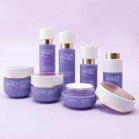 China Comprehensive Cosmetic Packaging Set featuring luxury glass bottles golden cap lotion bottles cream jars and cosmetic packaging for sale