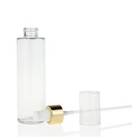 China Transparent 120ml Glass Lotion Bottles With Pump FDA Certificate Round Shape for sale