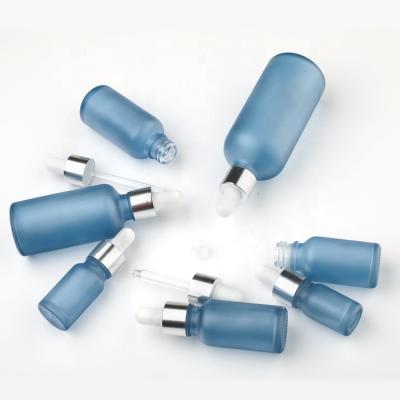 China Colored 30ml 50ml Essential Oil Dropper Bottles glass Base aluminum Collar for sale