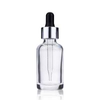 China Round Shape Empty Essential Oil Bottles 30ml Clear Glass Dropper Bottles for sale