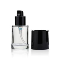 China Cosmetic 30ml Liquid Foundation Bottles Custom Round Shape Clear With Pump for sale