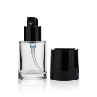 China Cosmetic 30ml Liquid Foundation Bottles Custom Round Shape Clear With Pump for sale