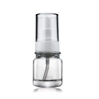 China Cosmetic Packaging 30ml Round Clear Serum Lotion Foundation Glass Bottle With Pump for sale