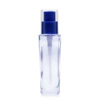 China Empty 33ml Liquid Foundation Bottles Cosmetic Glass Bottle Bule Pump Cap for sale