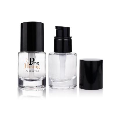 China 15ml Round Clear Empty Glass Foundation Bottle With Black Plastic Cap for sale