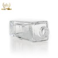 China Fancy Transparent 35ml Cosmetic Empty Square Glass Foundation Powder Bottle for sale