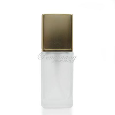China Frosted Foundation Glass Bottle 30ml Cosmetic Liquid Foundation Bottle With Gold Pump for sale