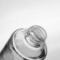 China Empty Clear 30ml Glass Foundation Bottle with White Pump Round Shape F139 for sale