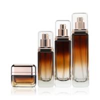 China Empty Square 120ml Lotion Glass Bottles Spray Pump 4 Oz Amber Glass Bottles for sale