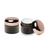 China 30g 1oz Round Amber Glass Cream Jars Cosmetic Containers With Screw Cap for sale