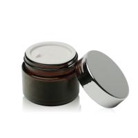 China 30g 1oz Round Amber Glass Cream Jars Cosmetic Containers With Screw Cap for sale