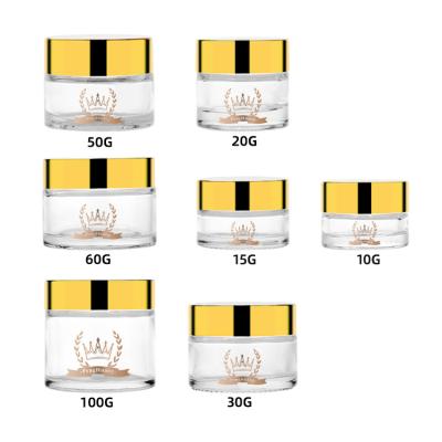 China Round 15g-100g Cream Glass Jars Transparent Skin Care Packaging for sale