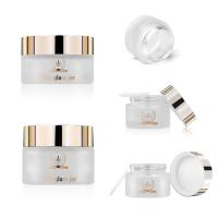 China 200g Frosted Glass Jars With Gold Lids OEM ODM Customizable for sale