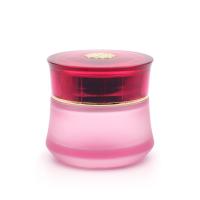 China Luxury Pink 50ml Cream Glass Jars Round Frost With Plastic Cap for sale