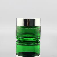 China Empty Green Cream Glass Jars 5g-100g With Silver Lid For Cosmetic for sale