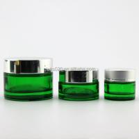 China Empty Green Cream Glass Jars 5g-100g With Silver Lid For Cosmetic for sale