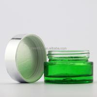 China Empty Green Cream Glass Jars 5g-100g With Silver Lid For Cosmetic for sale