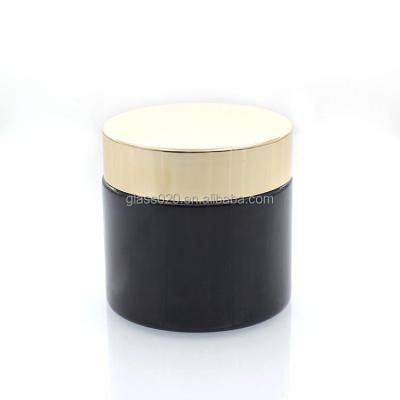 China Glossy Black 60g Cream Jar Packaging glass material With Plastic Lid for sale