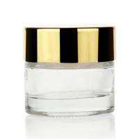 China Luxury OEM 10g Clear Glass Cosmetic Jars Gold Cover Clear For Cream for sale