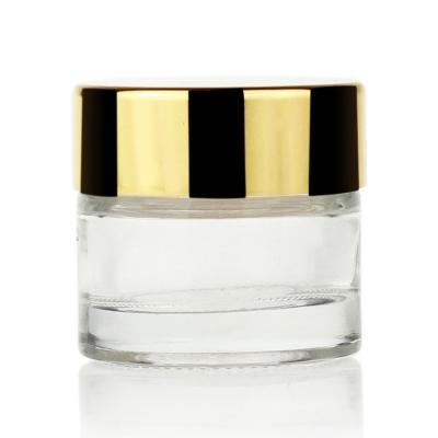 China Luxury OEM 10g Clear Glass Cosmetic Jars Gold Cover Clear For Cream for sale