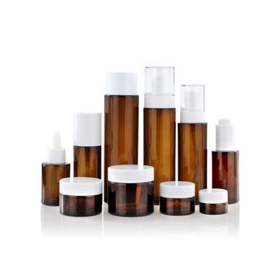 China Round Amber Glass Skincare Packaging Customized 20ml 30ml 50ml 80ml 100ml for sale
