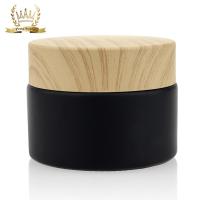 China 50g Cosmetic Packaging Set Bamboo Screw Cap Black Matte Glass Jars for sale